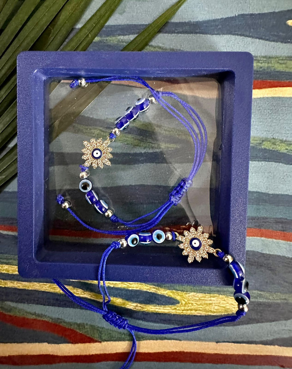 Diamond sun evil eye band – Coral Tree